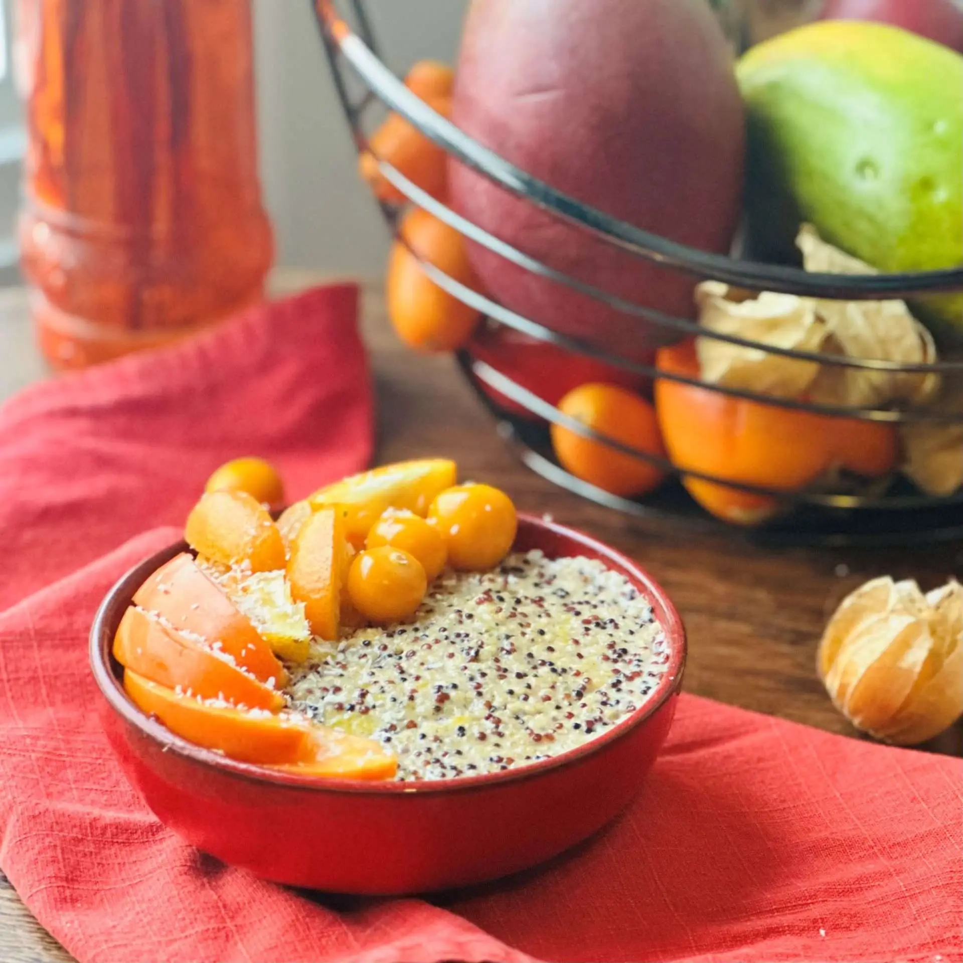 Exotische quinoa pudding met oranje fruit - Discovered